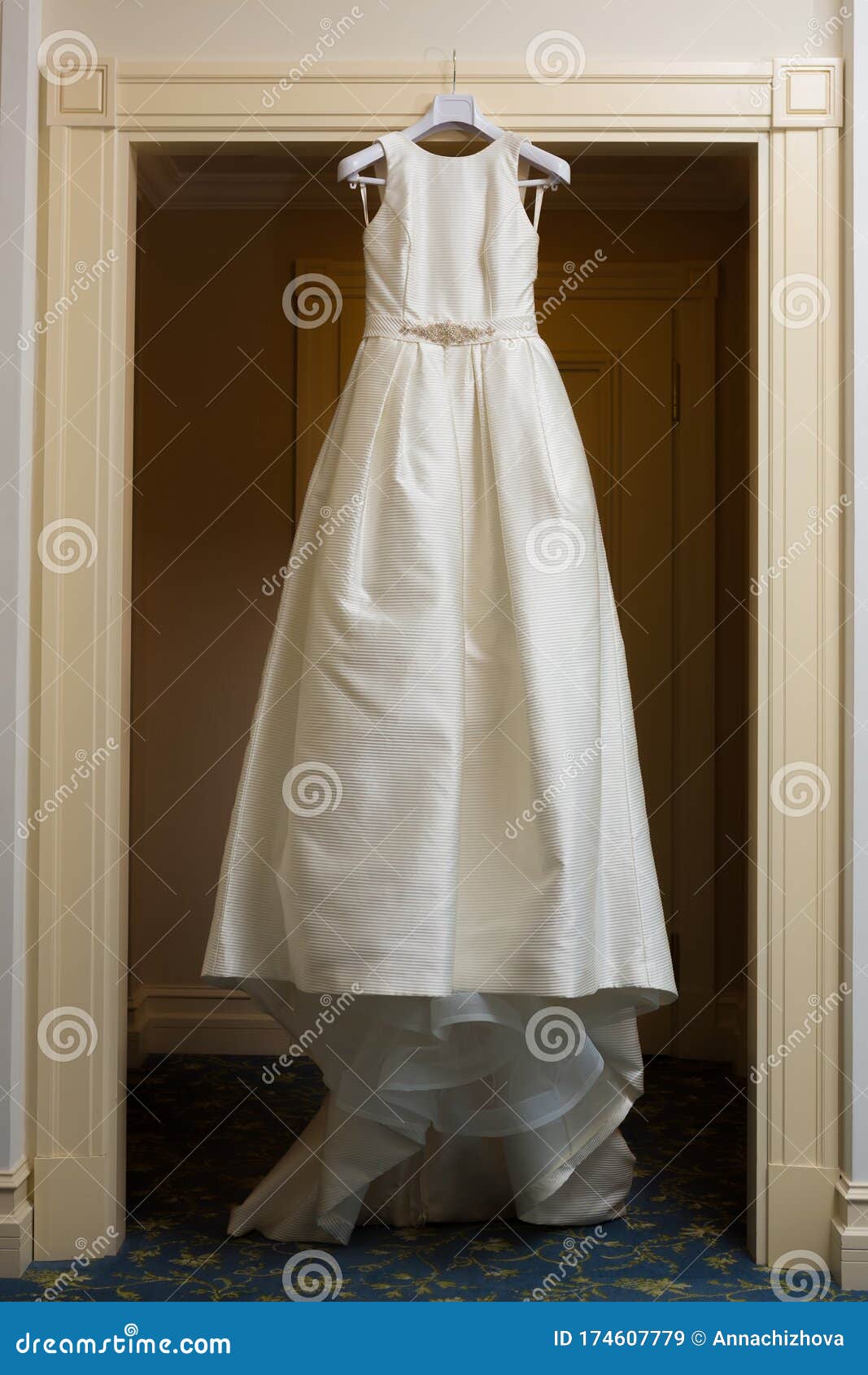 Wedding Dress Hanging Up by the Door. Stock Image - Image of hanging ...