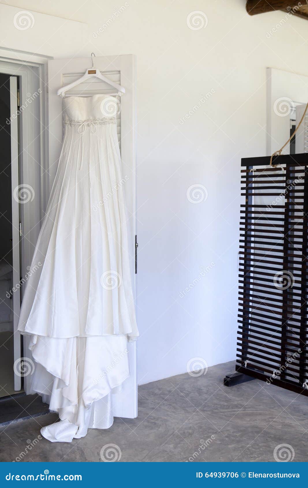 Wedding Dress Hanging Up by Door Stock Photo - Image of expensive ...