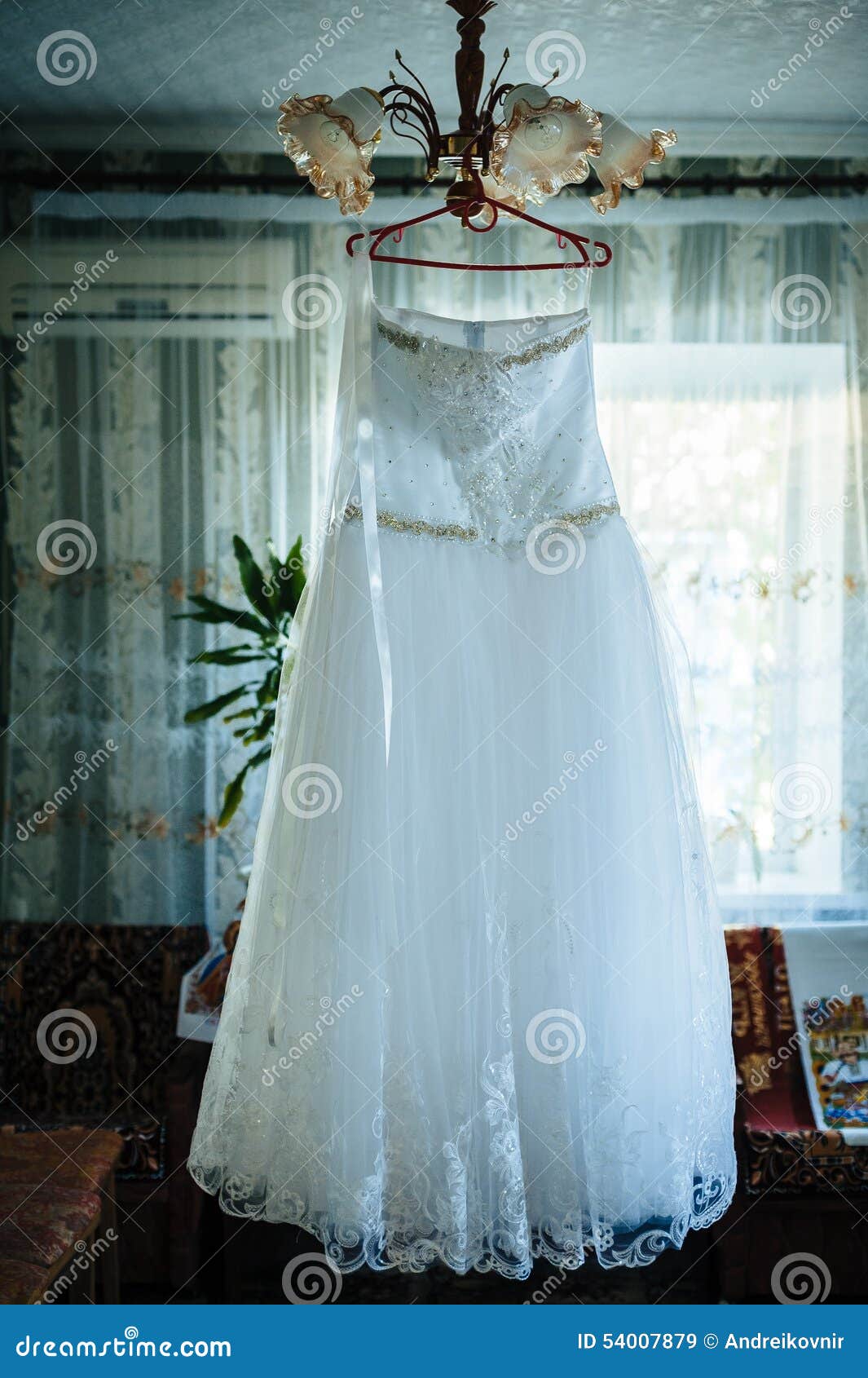 Wedding Dress Hanging in a Window Stock Image - Image of garment ...