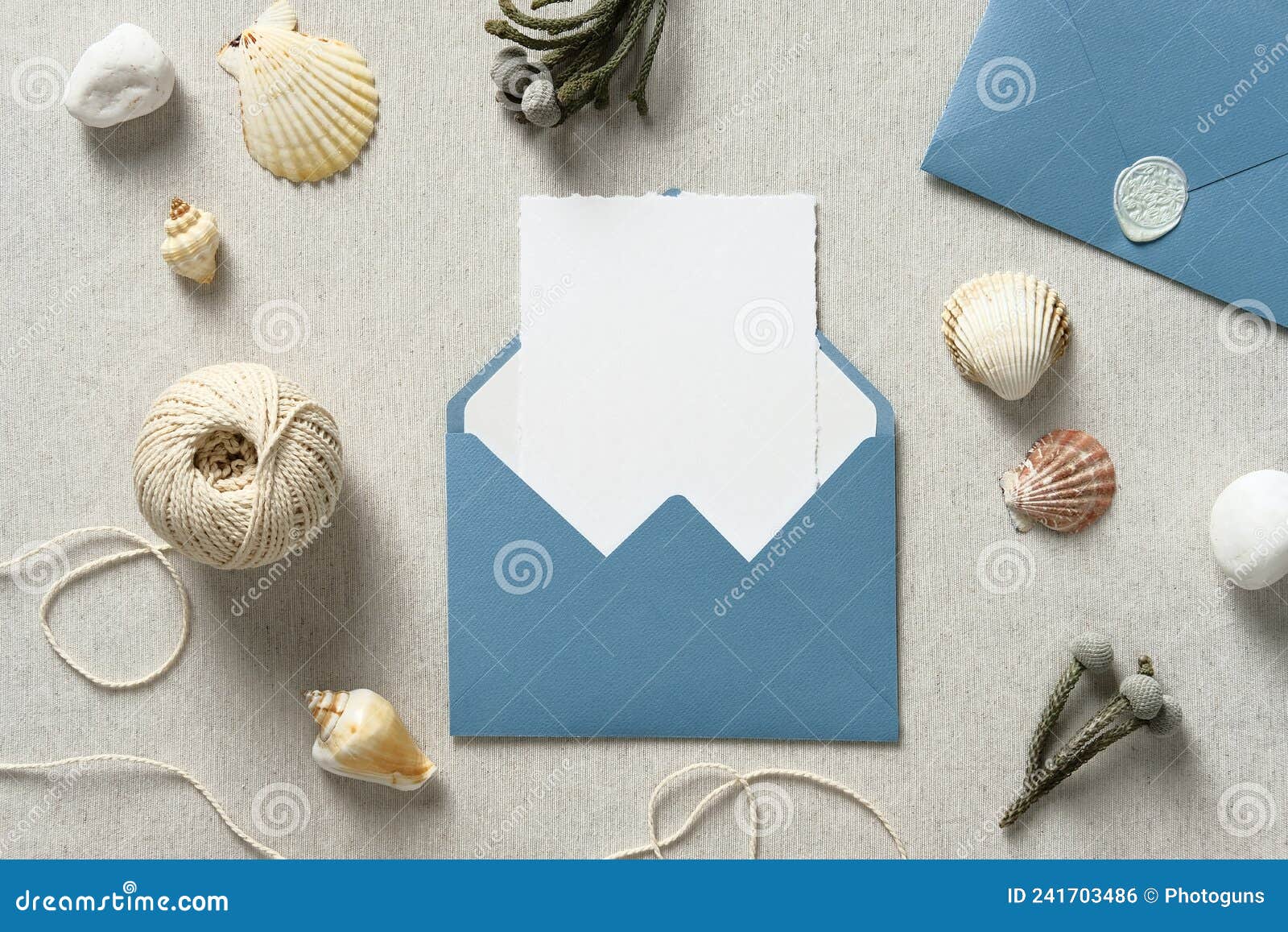 Wedding Envelope with Invitation Card Mockup Inside and Seashells on ...