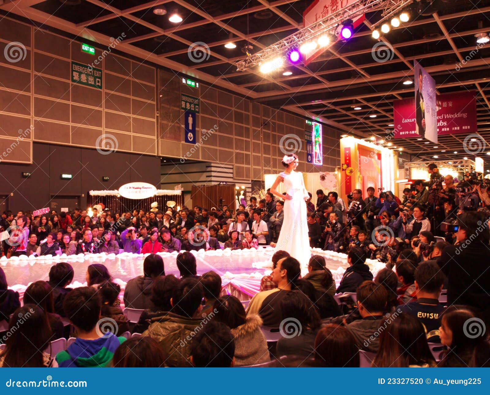 Fashion Show Of Wedding Dress And Evening Gown Along Chandelier ...