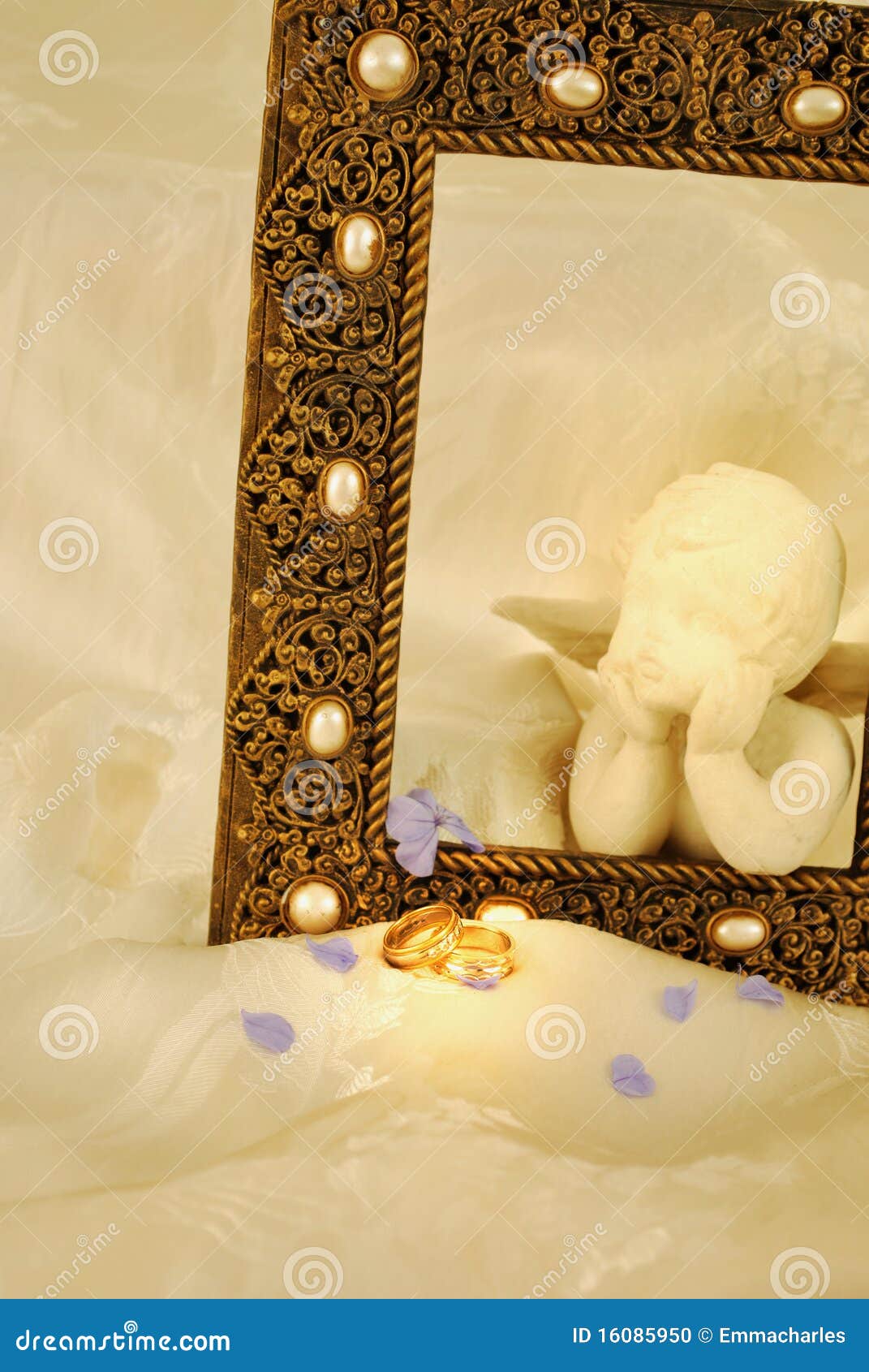 Cherub Watching Over the Wedding Bands Stock Photo - Image of love ...