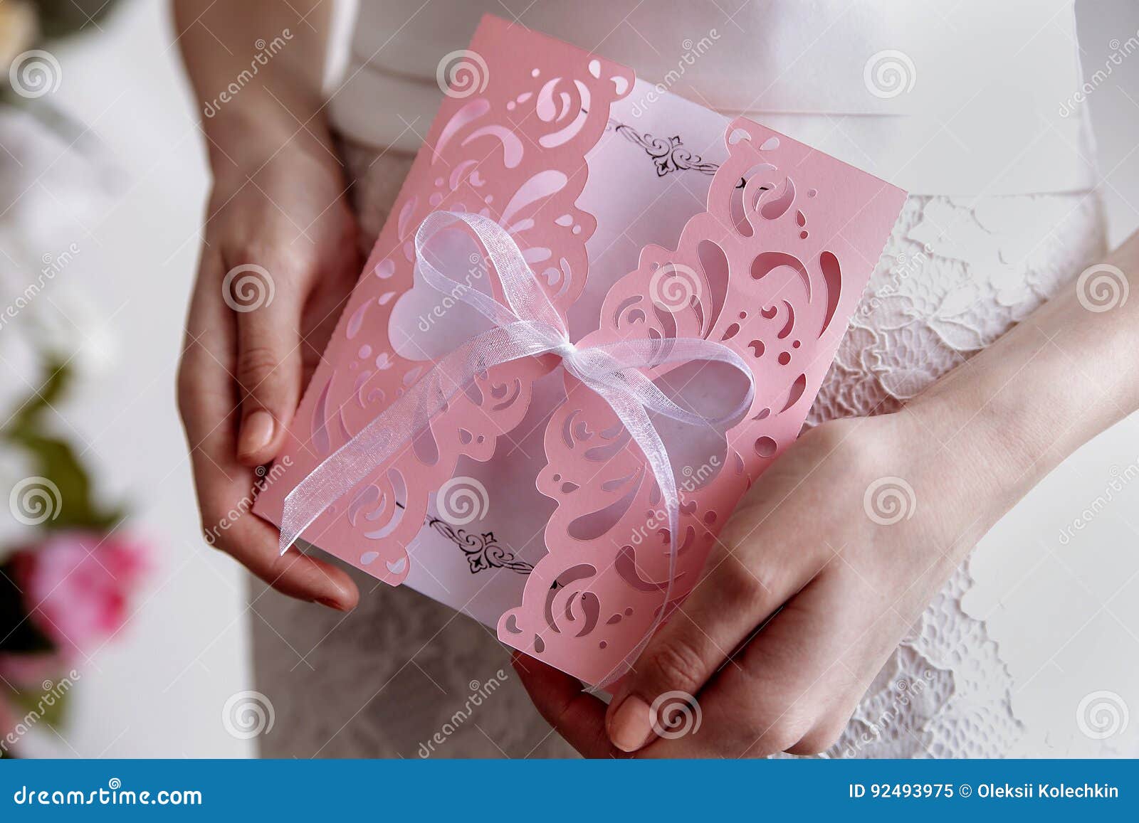 Wedding Invitation Pink Card in the Hands of the Bride Stock Image ...