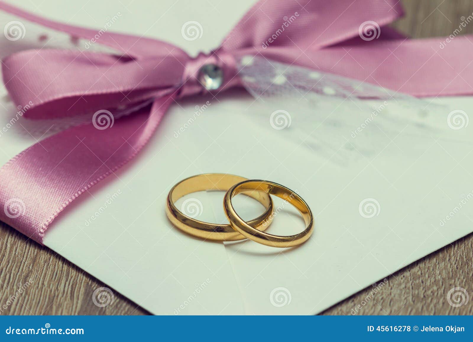 Wedding Invitation and Rings Stock Photo - Image of shallow, field ...