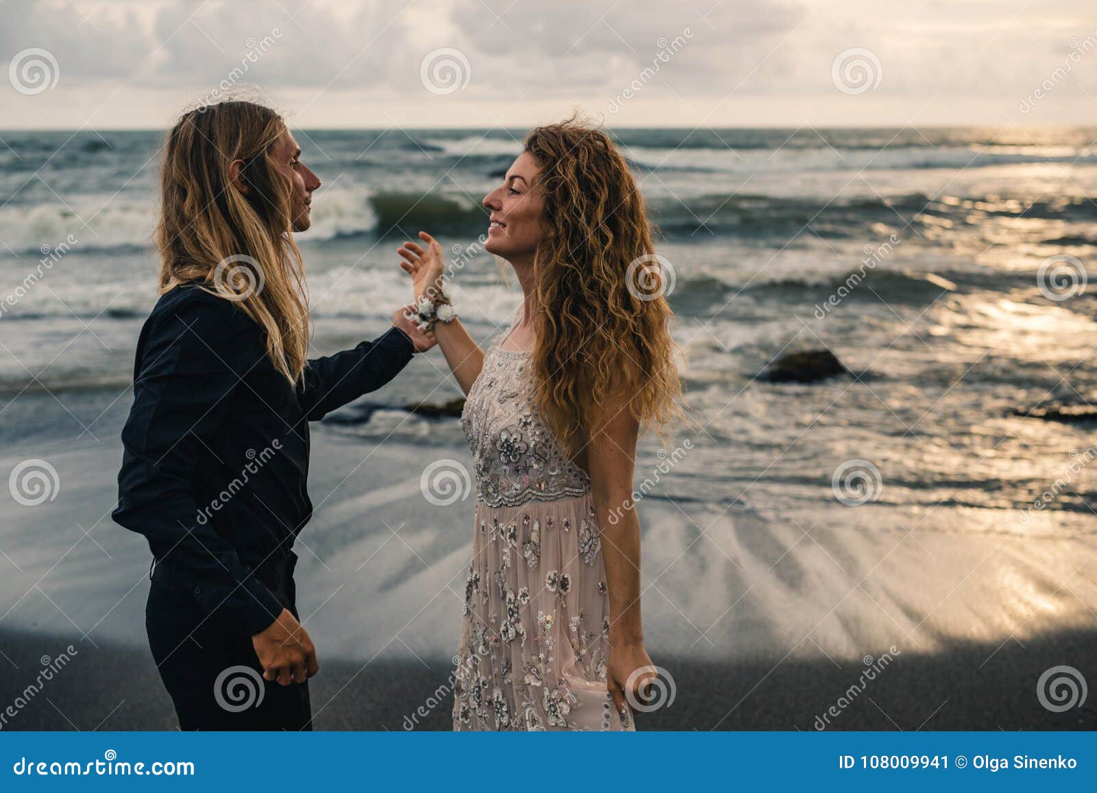 Wedding Lovestory Just Married Couple Near The Ocean At Sunset Stock