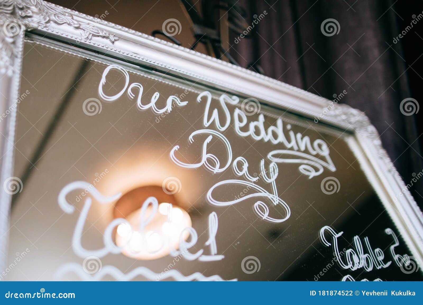 Wedding Mirror Board with Guest List and Table Numbers on it Stock ...