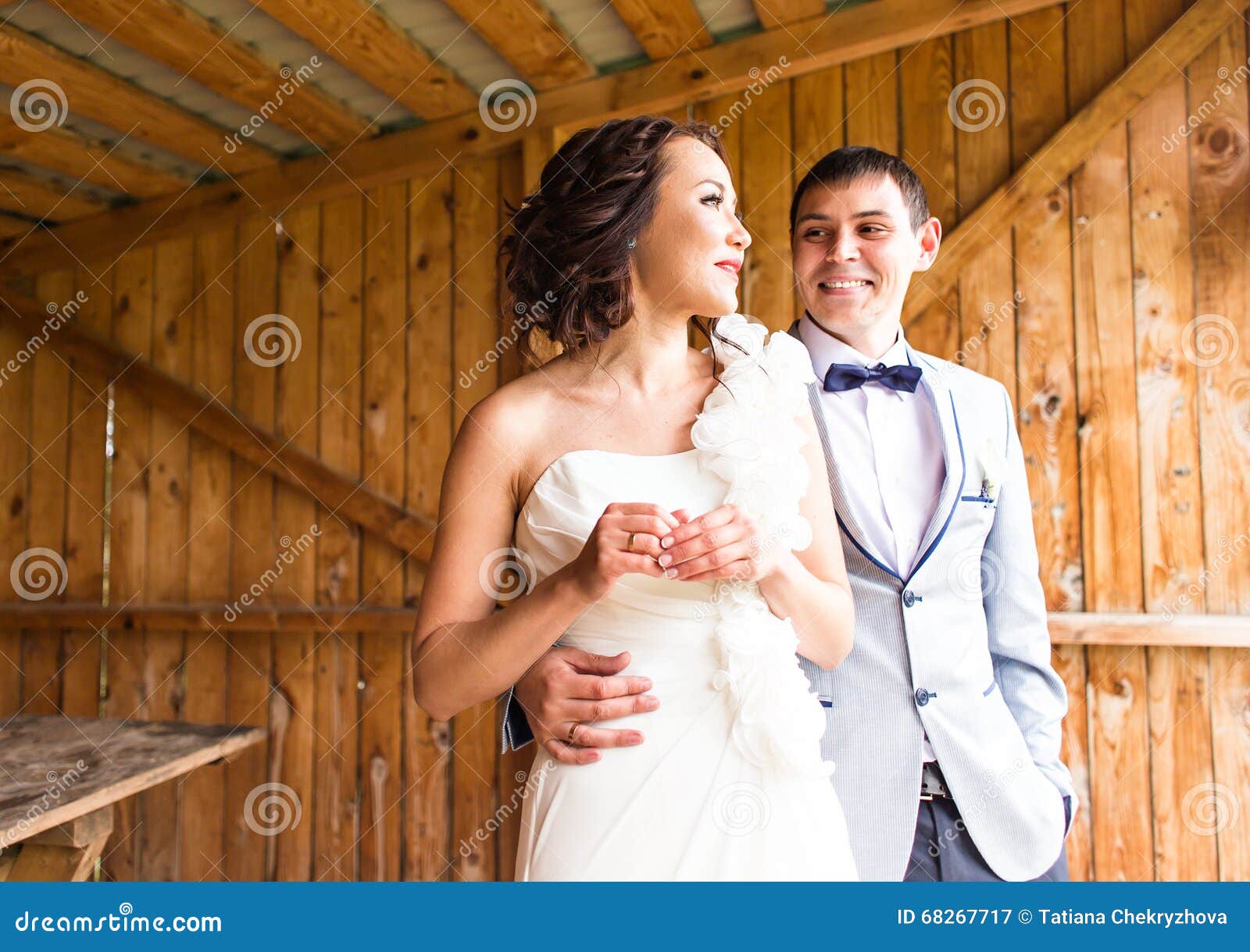 Wedding pair hugging stock image. Image of cute, enamored - 68267717