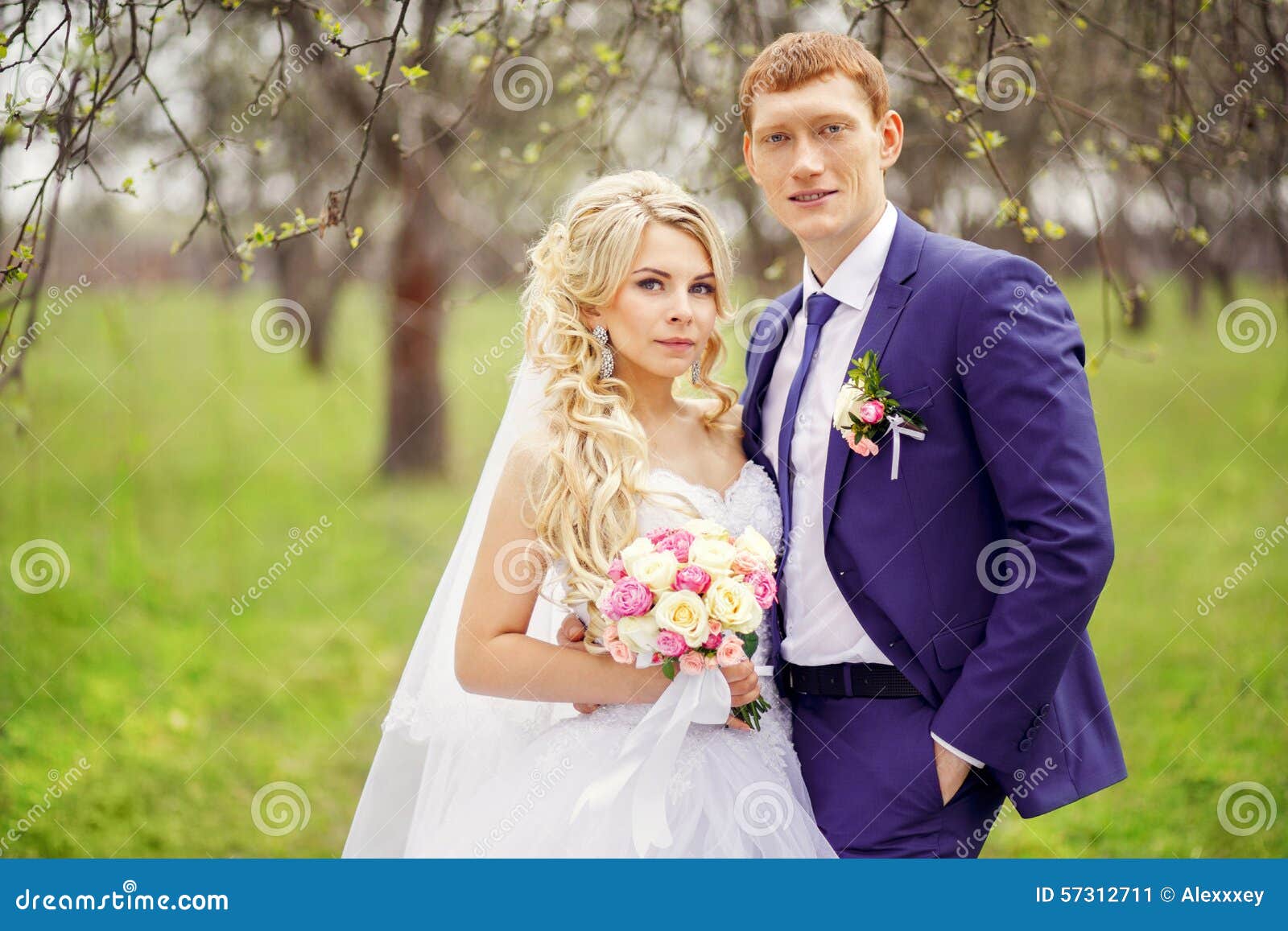 Wedding Portrait of the Bride and Groom in the Spring Garden Stock ...