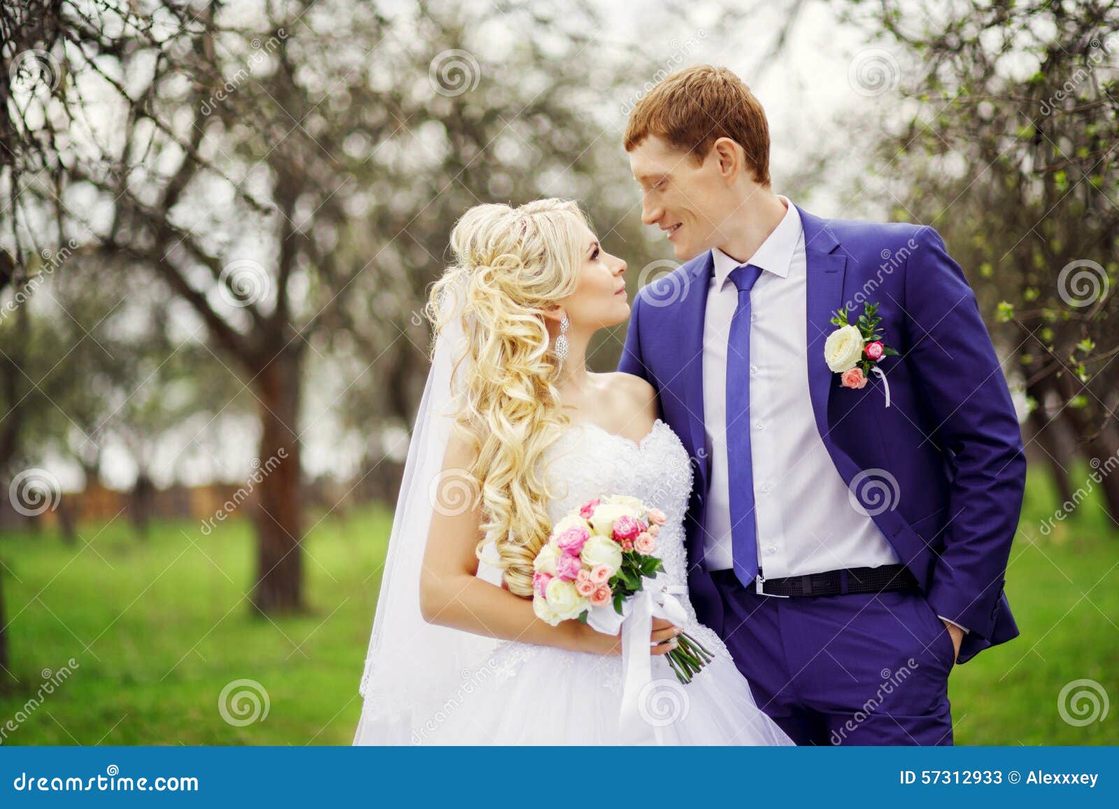 Wedding Portrait of the Bride and Groom in the Spring Garden Stock ...