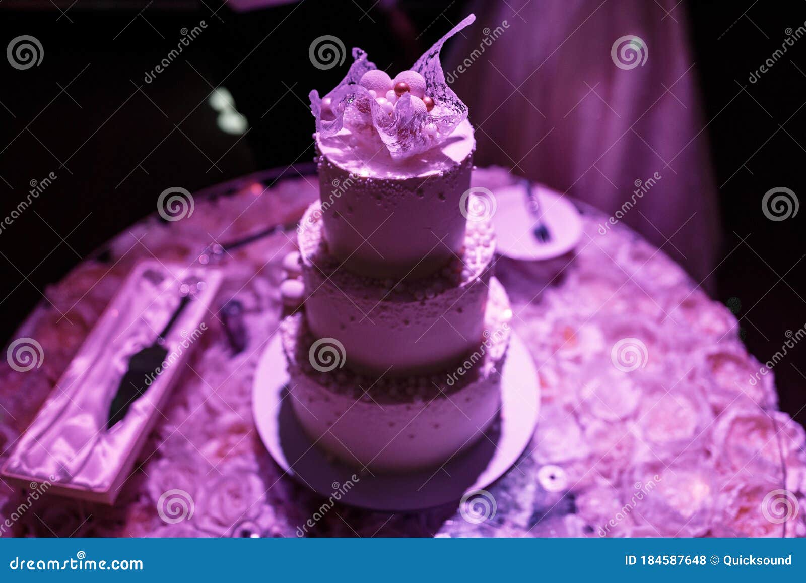 Purple Wedding Cake Spotlight Stock Photo - Image of reception ...