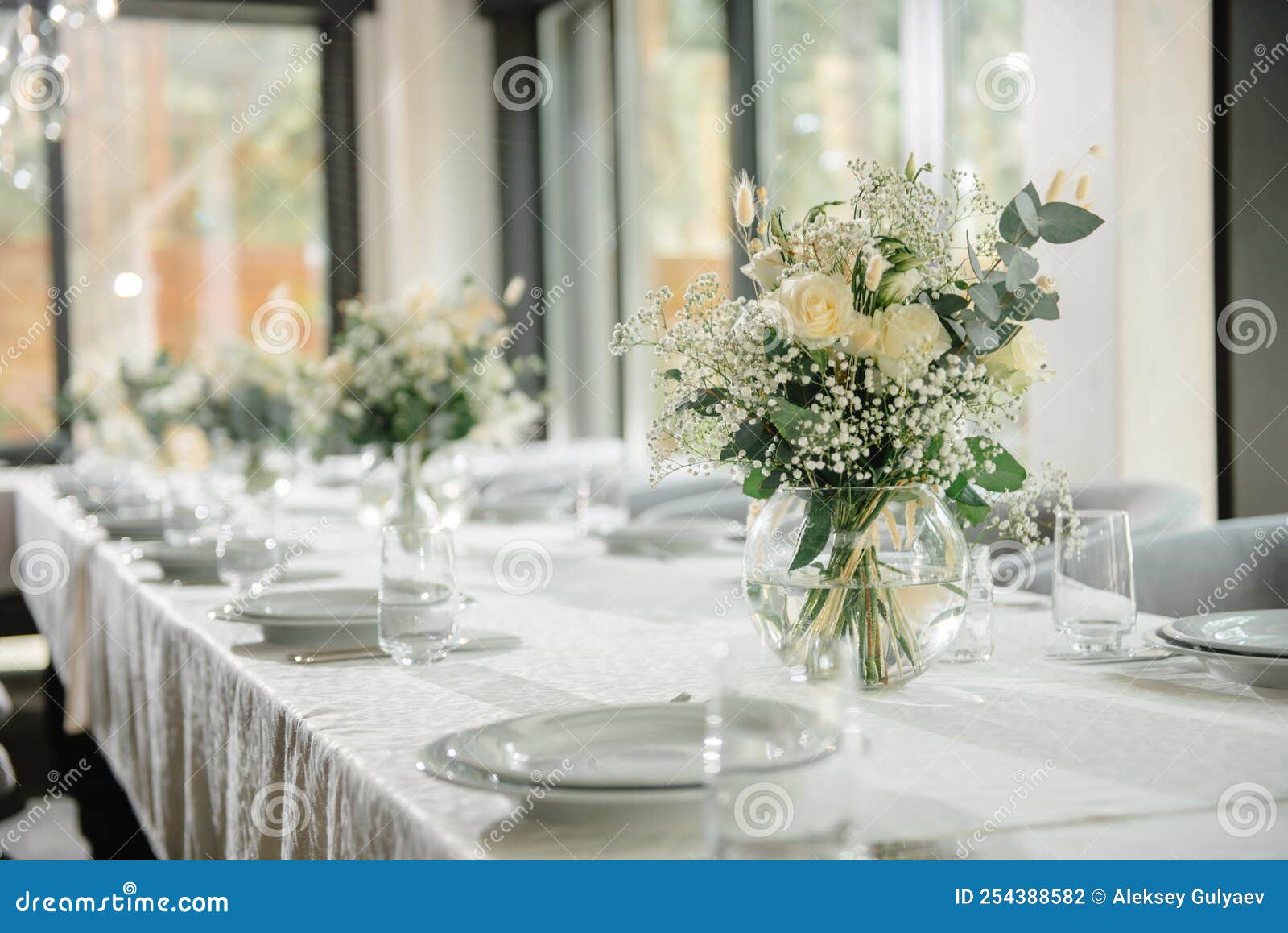 Wedding Reception Table in the Restaurant Decorated with White Candles ...