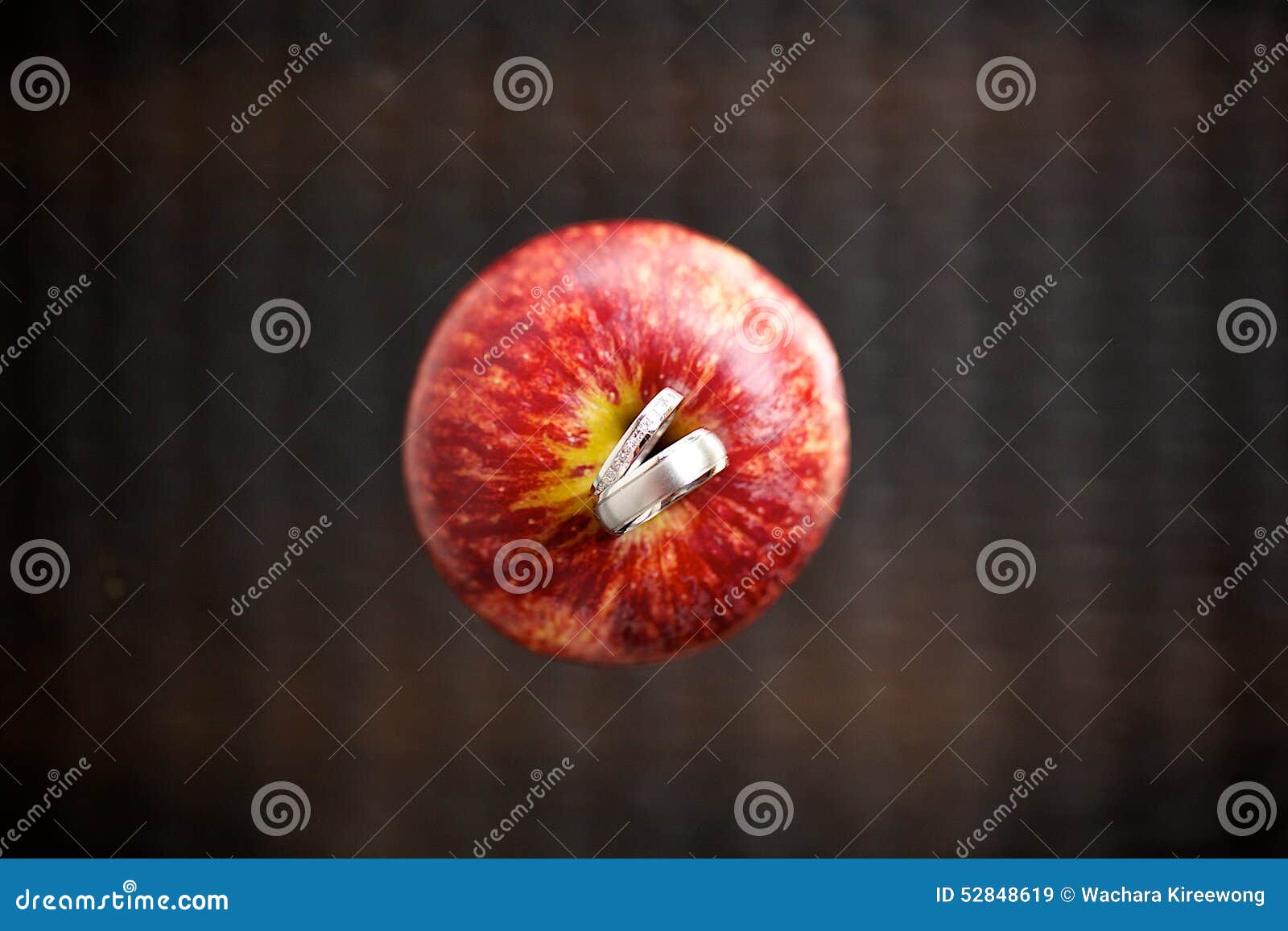Wedding ring on apple stock image. Image of happy, gift - 52848619