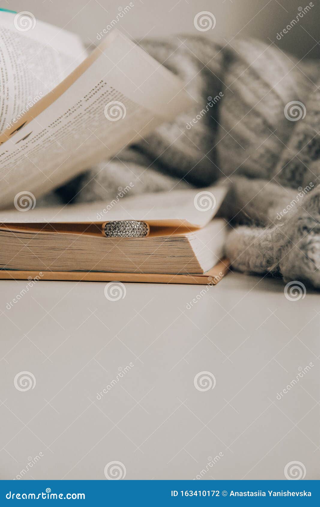 Wedding ring in the book stock photo. Image of education - 163410172