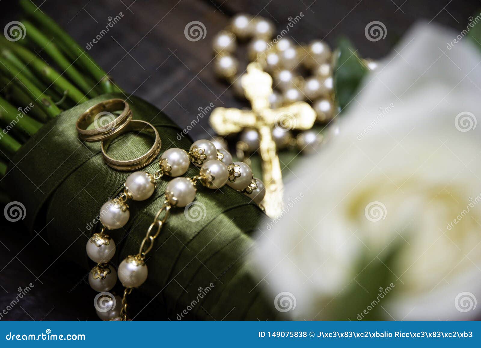 Wedding Ring on Cable of Bouquet of Flowers Stock Photo - Image of ...