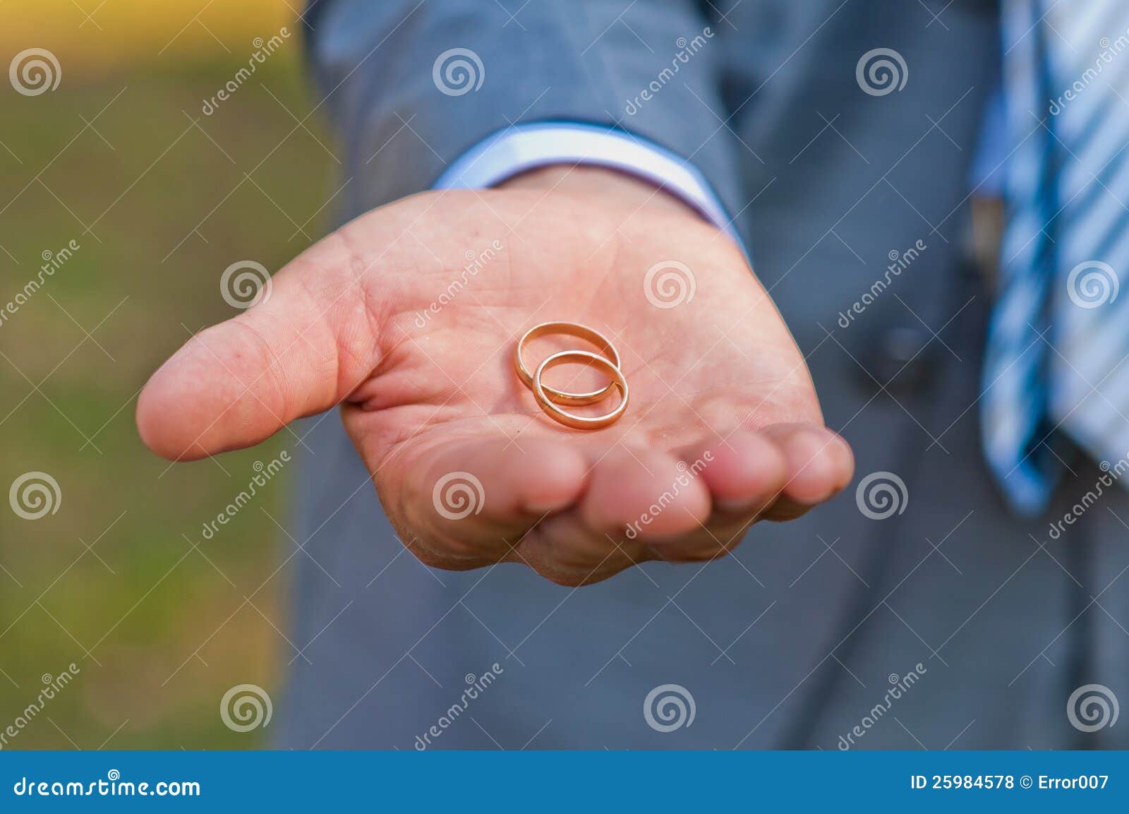 Wedding ring in hand stock photo. Image of gold, golden - 25984578