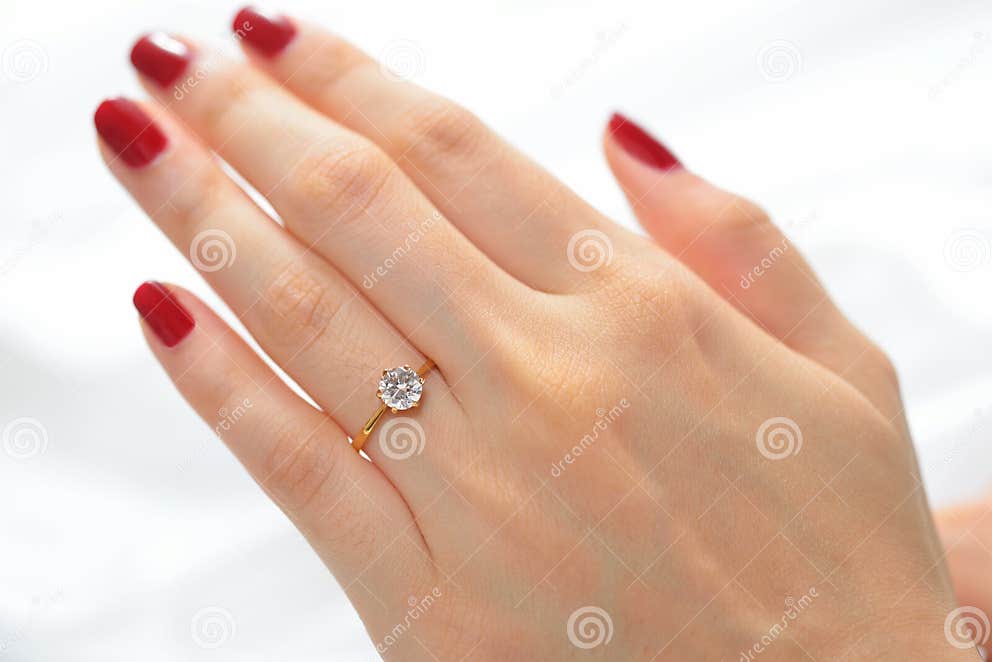 Wedding ring stock photo. Image of background, hand, white - 49992560