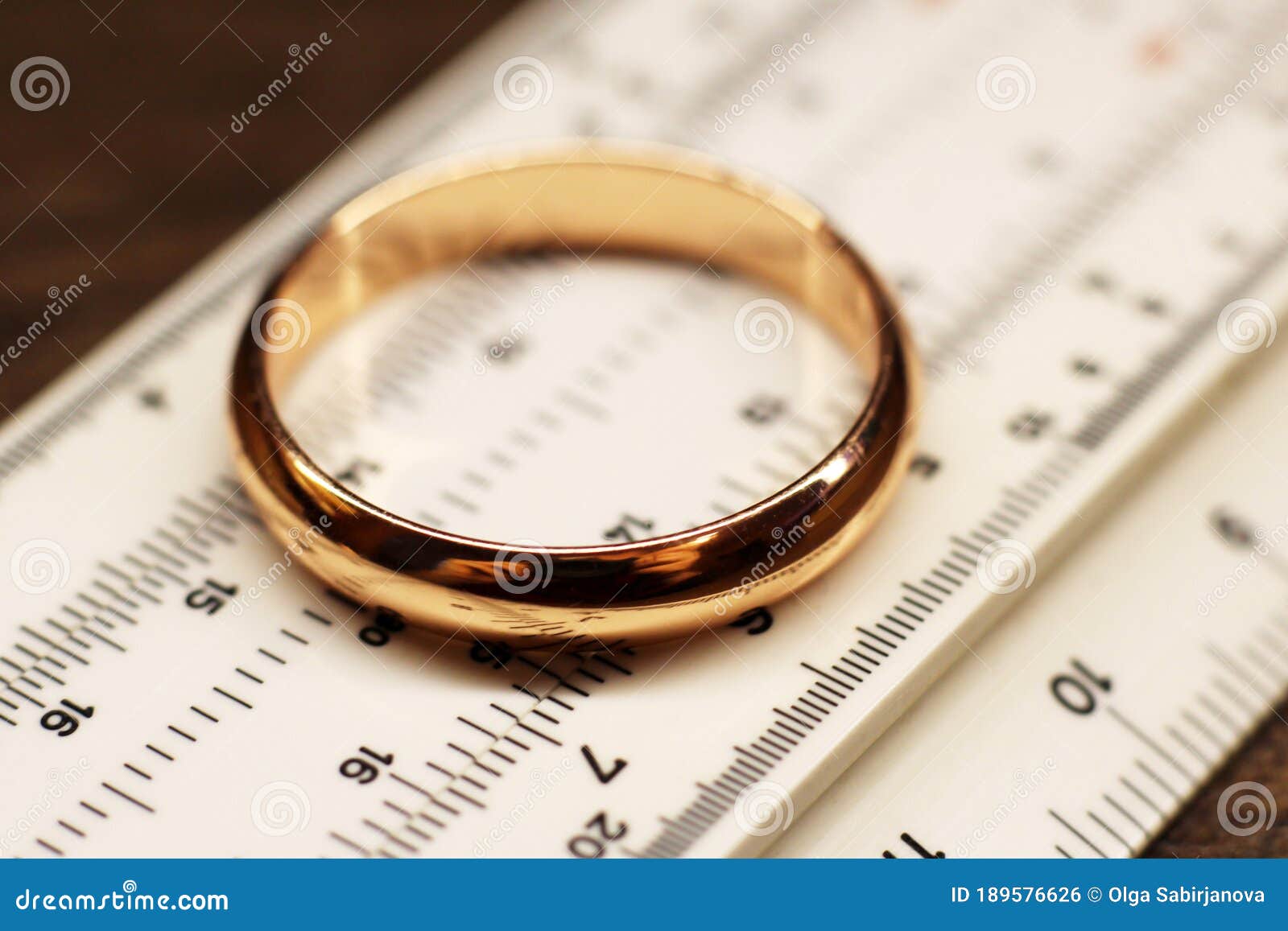 Wedding Ring and Measuring Device Stock Photo - Image of macro, metal ...