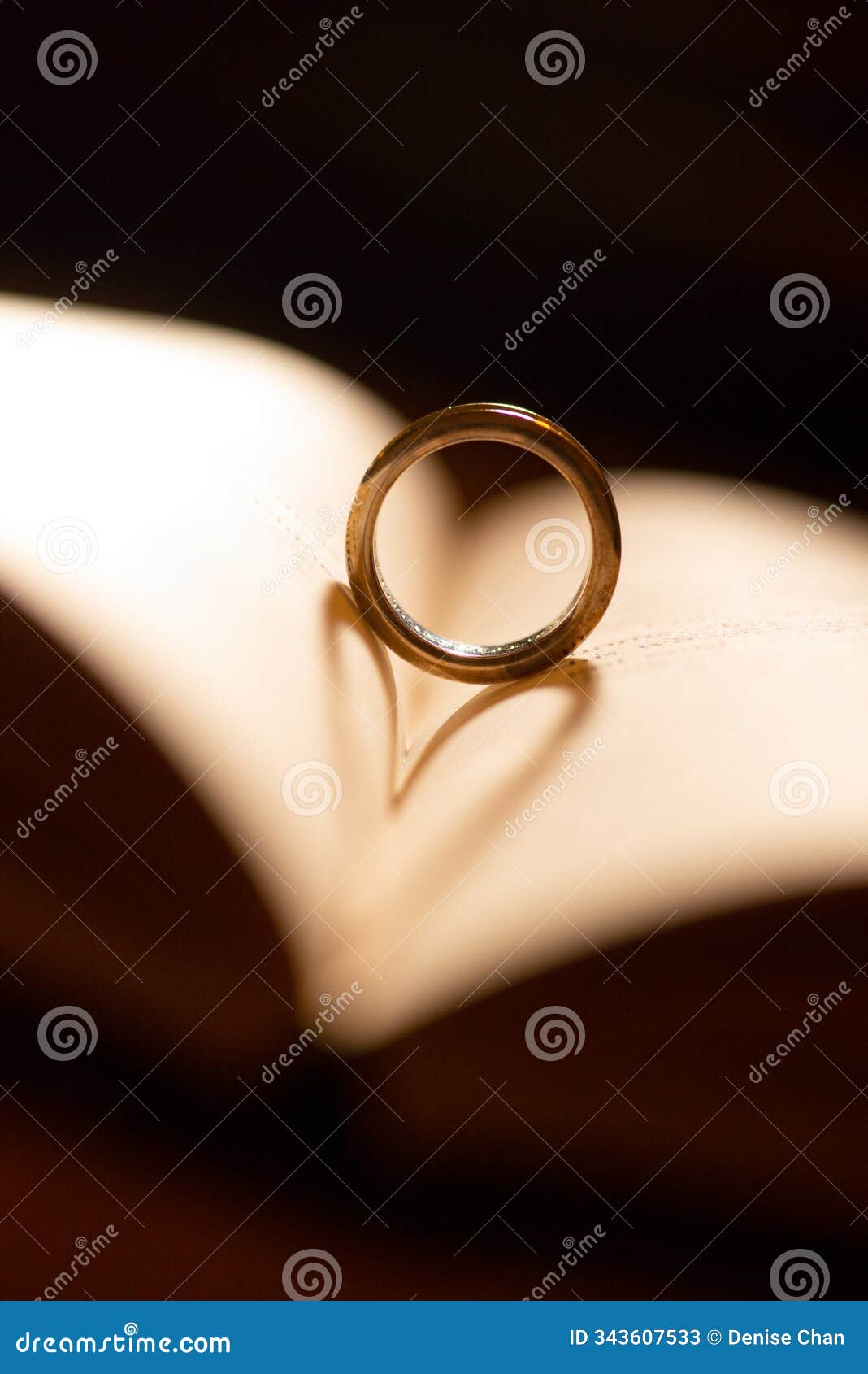 Wedding ring on the pages stock image. Image of romance - 343607533