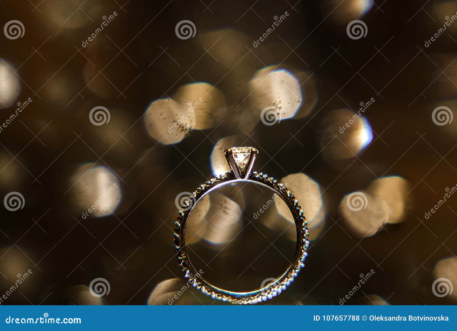Wedding Ring on the Reflecting Surface with Highlights Stock Photo ...