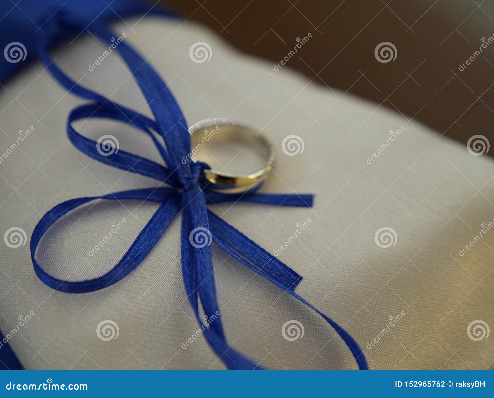 Wedding ring with ribbon stock photo. Image of luxury - 152965762