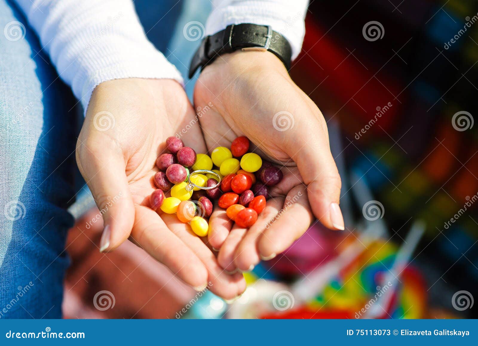 Wedding Ring in the Sweets in the Hands of Women Stock Image - Image of ...