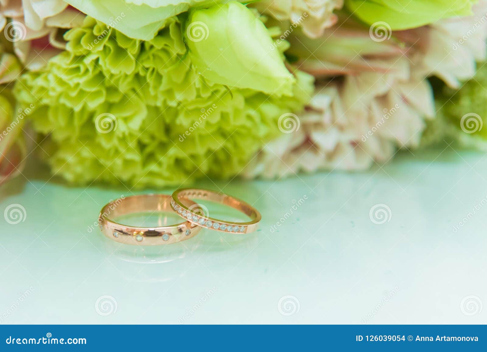 Wedding Ring. Two Gold Rings with Diamonds of the Bride and Groom are ...