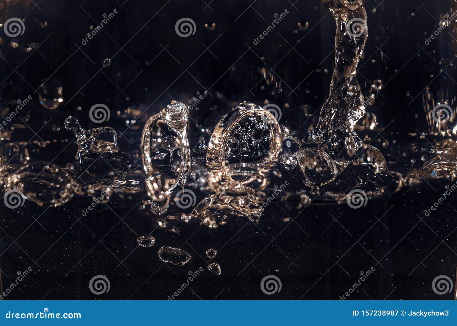 Wedding Ring with Water Splash Stock Image - Image of couplering ...