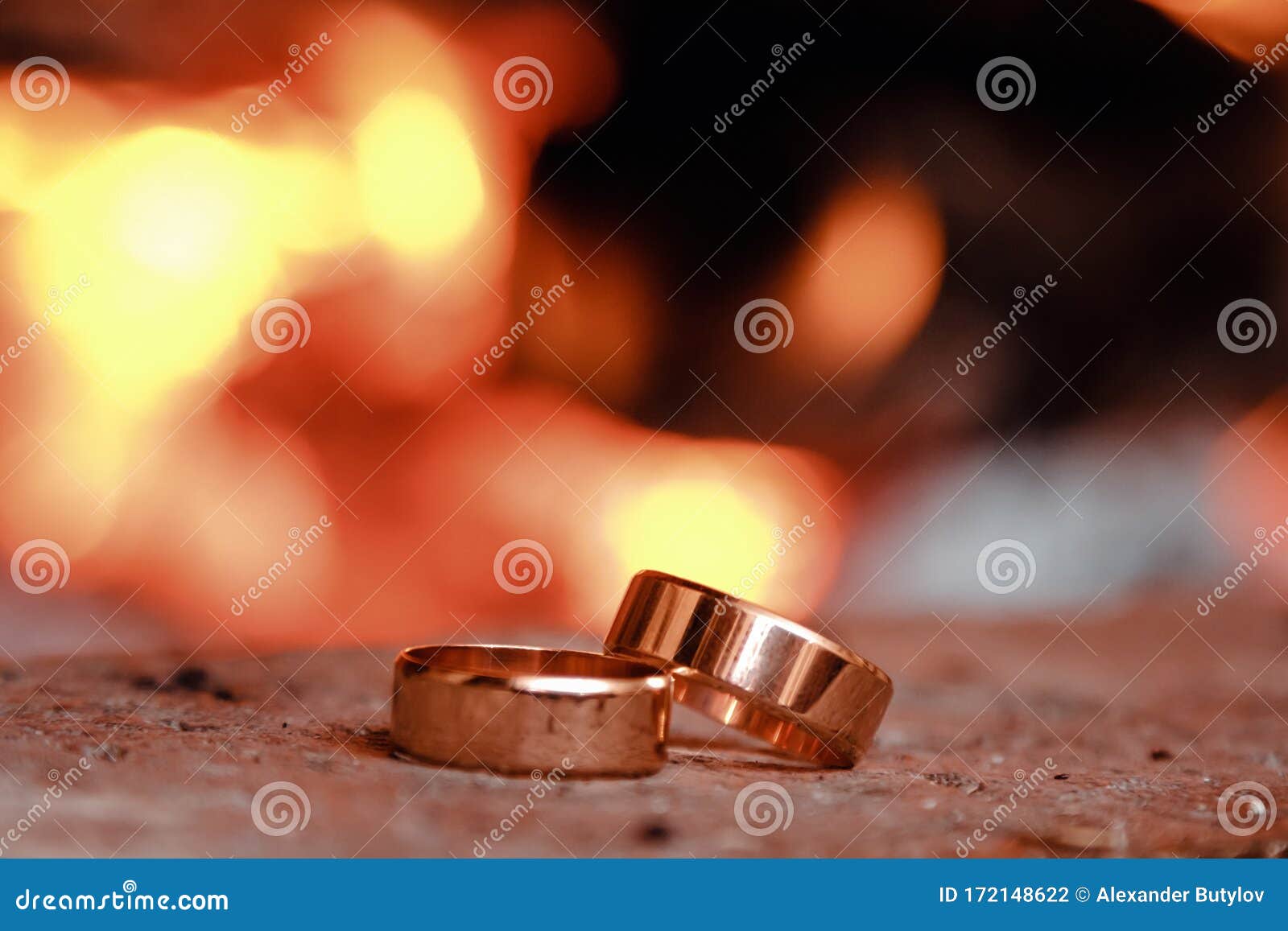 Wedding Rings Against the Background of Fire Stock Photo - Image of ...