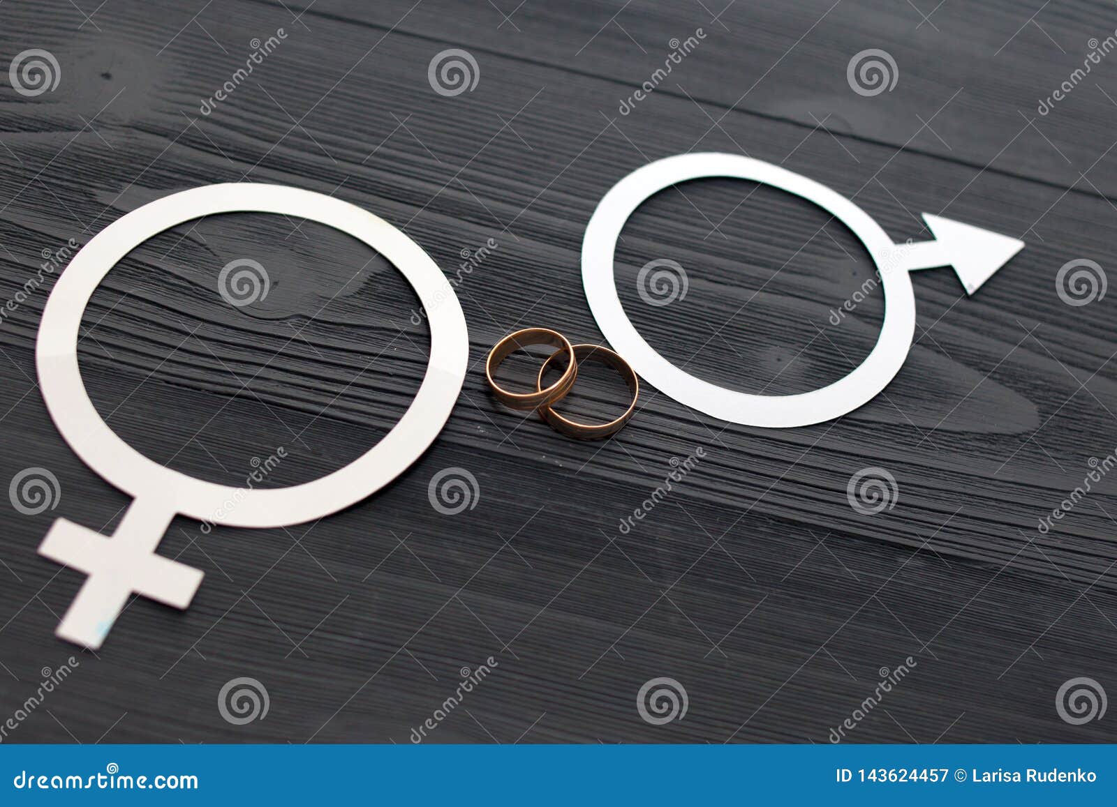 Wedding Rings On The Beautiful Hardwood Background The Concept Of