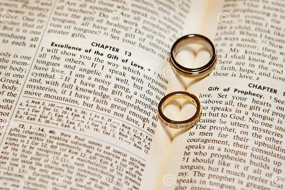 Wedding rings on a bible stock photo. Image of sacrament - 4331816