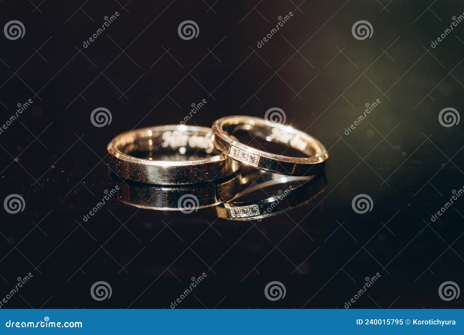 Wedding rings on the table stock image. Image of closeup - 240015795