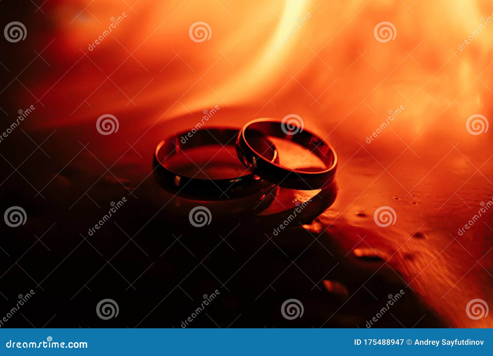 Wedding Rings in a Flame of Fire. Traditions. Stock Image - Image of ...