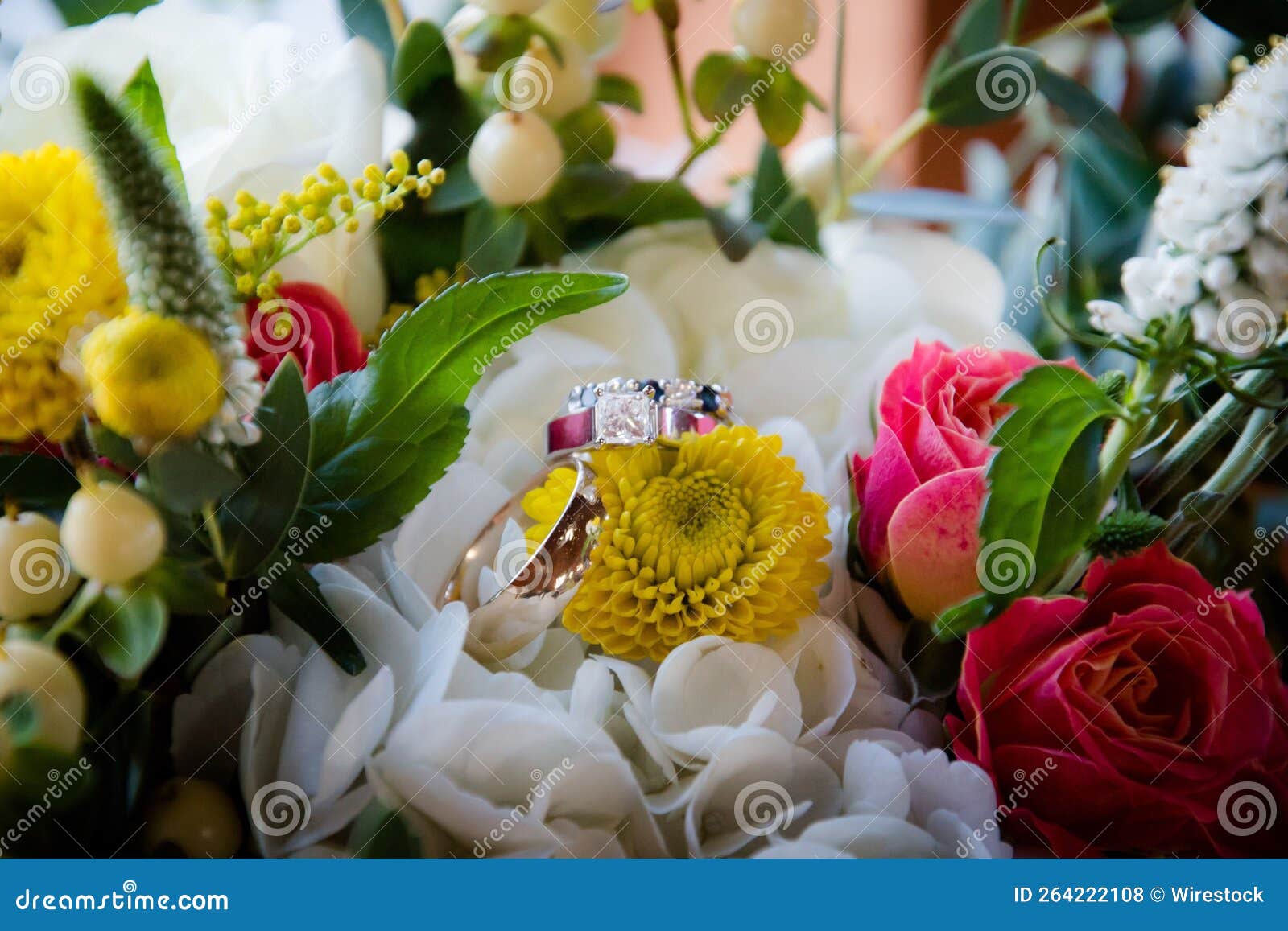 Wedding Rings on a Flower in a Beautiful Bouquet Stock Photo - Image of ...