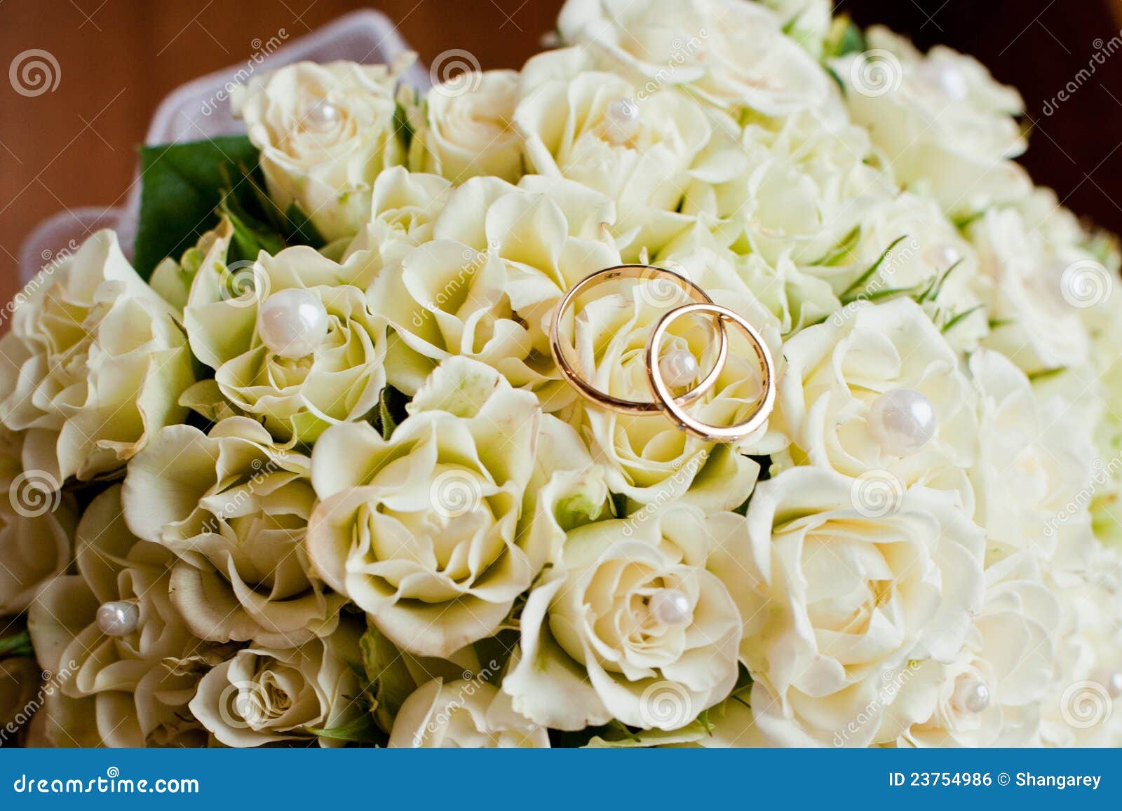 Wedding rings and flowers stock photo. Image of ceremony - 23754986