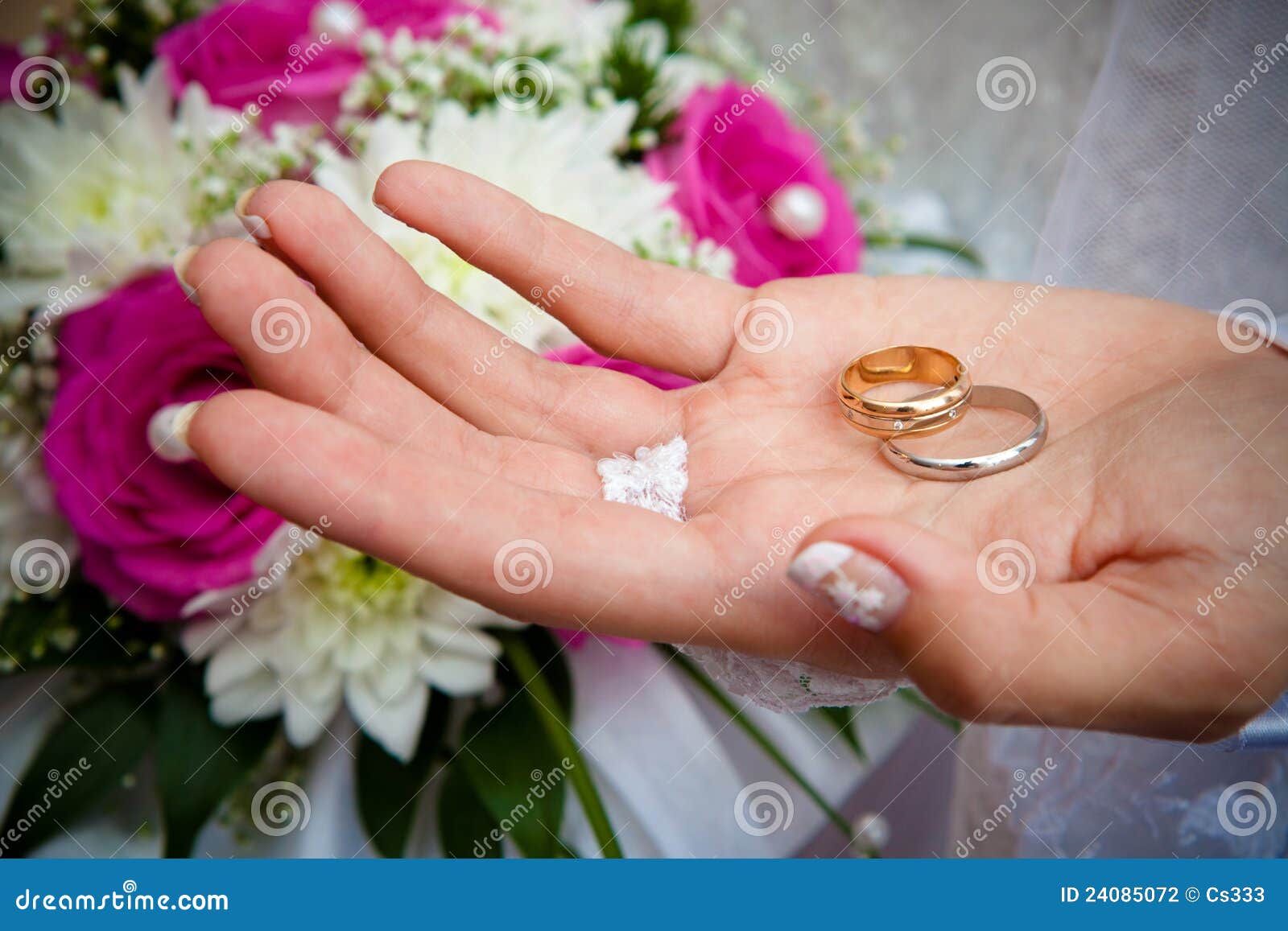 Wedding rings and flowers. stock photo. Image of roses - 24085072
