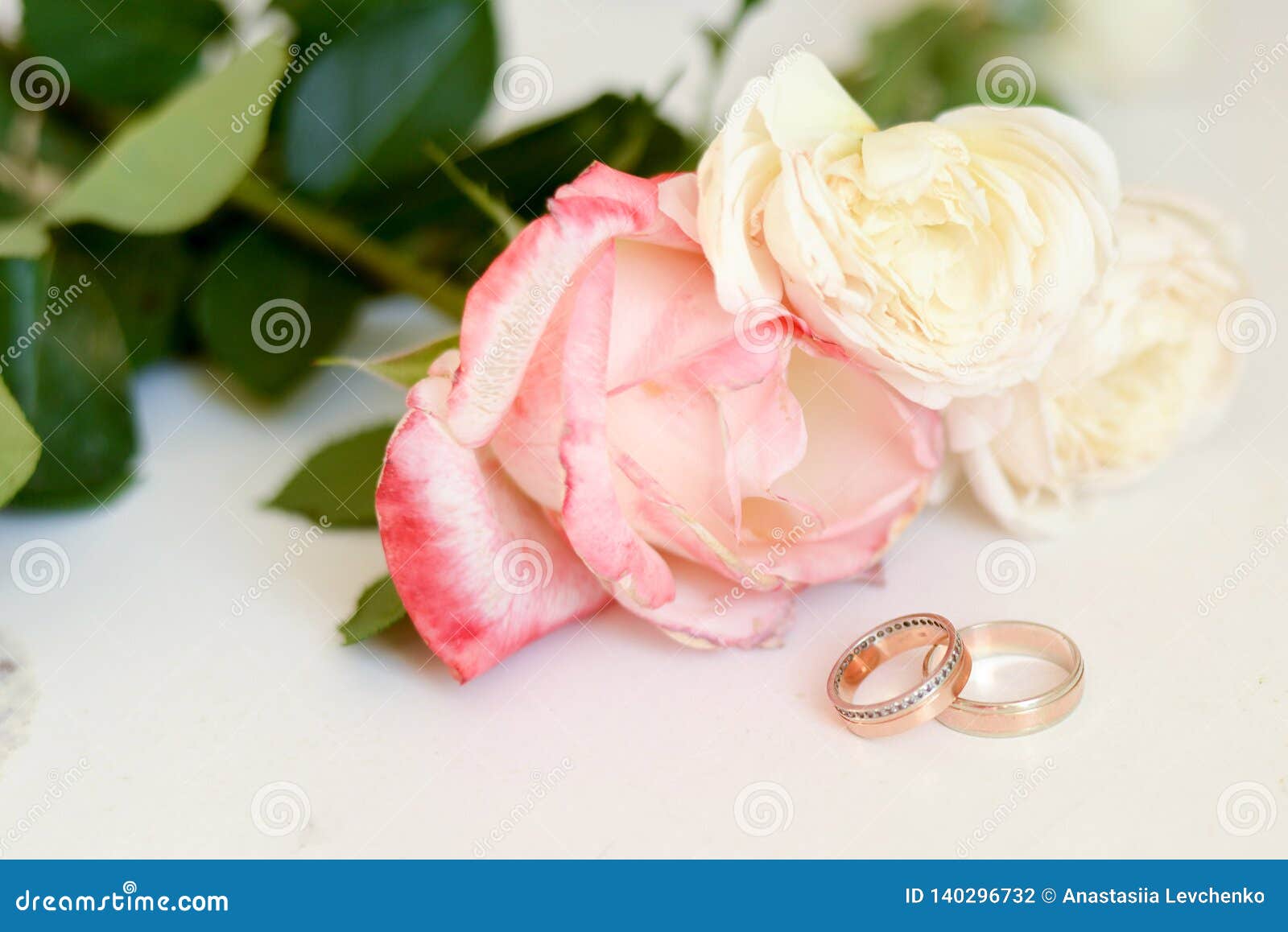 Wedding Rings on Flowers Background Stock Photo - Image of flower, love ...