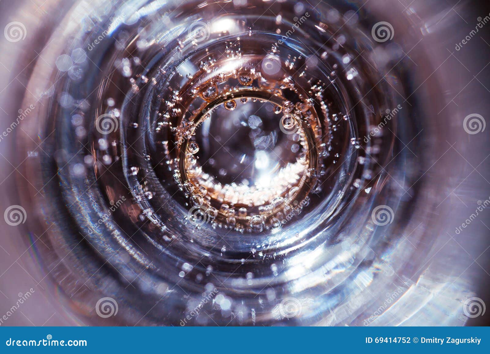 Wedding Rings in a Glass of Water and Air Bubbles Stock Photo - Image ...