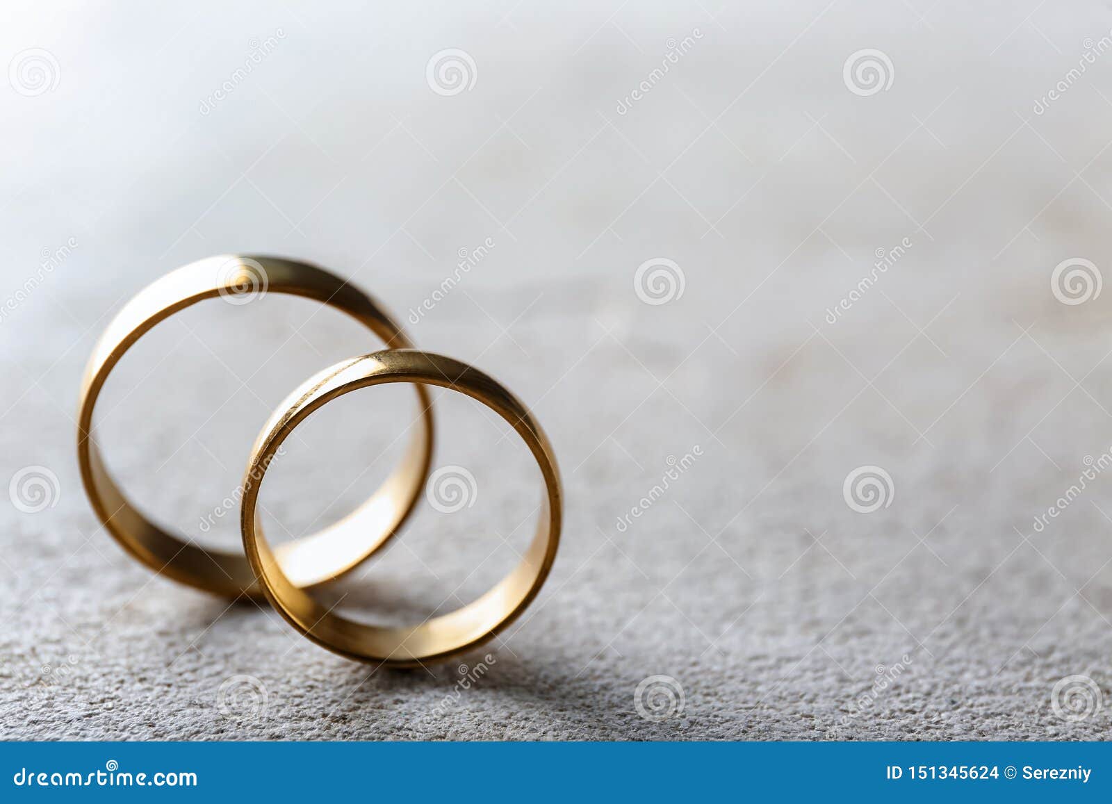 Wedding Rings on Grey Background Stock Photo - Image of golden, luxury ...