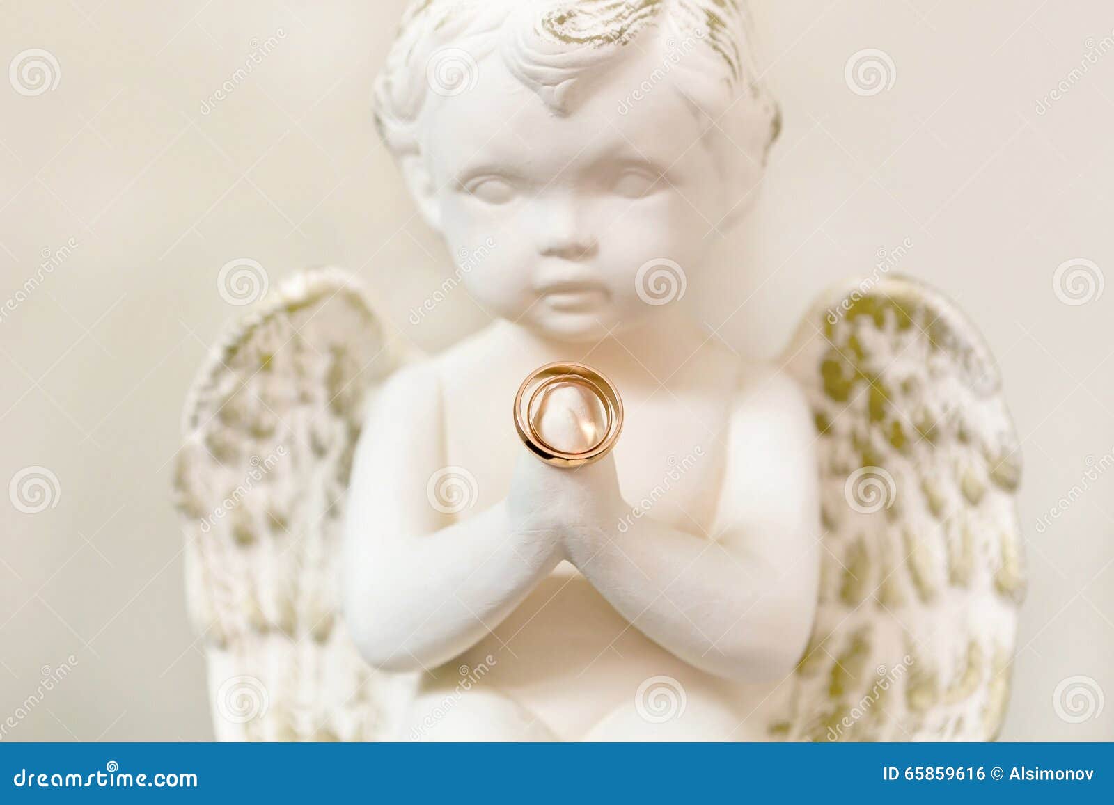 Wedding Rings in the Hands of an Angel. Stock Photo - Image of angel ...