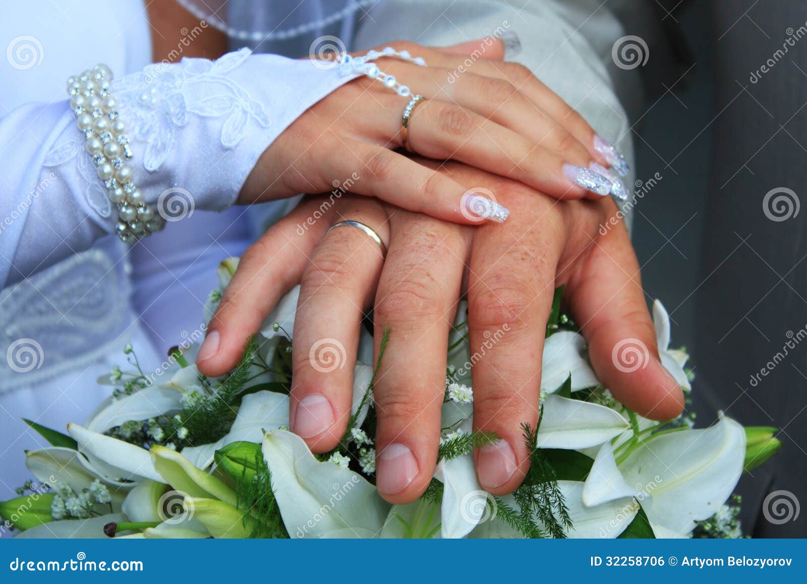 Wedding rings and hands stock photo. Image of jewelry - 32258706