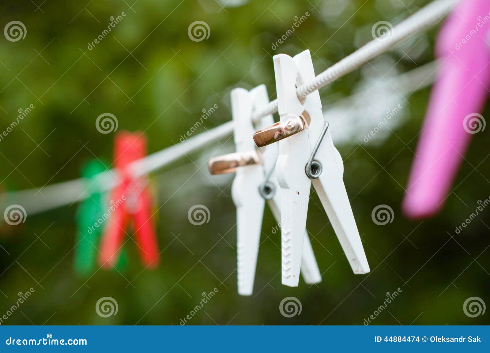 Wedding Rings Hanging on a String Stock Photo - Image of marriage ...