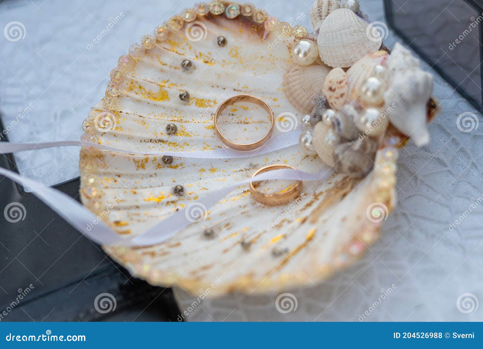 Wedding Rings Inside a Shell Stock Photo - Image of anniversary ...