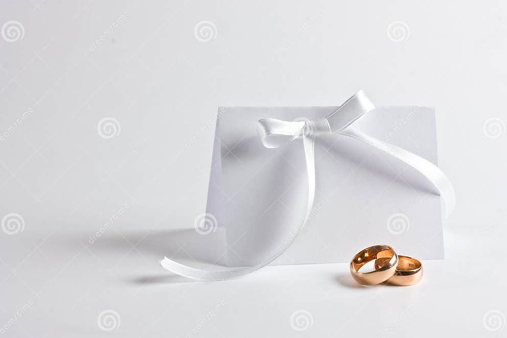 Wedding rings and invite stock photo. Image of beauty - 18227140