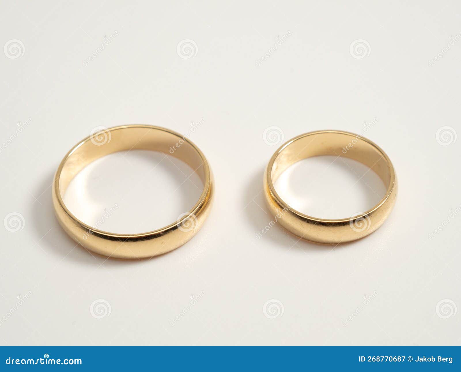 Wedding Rings on a Light Background. Gold Rings Stock Image - Image of ...