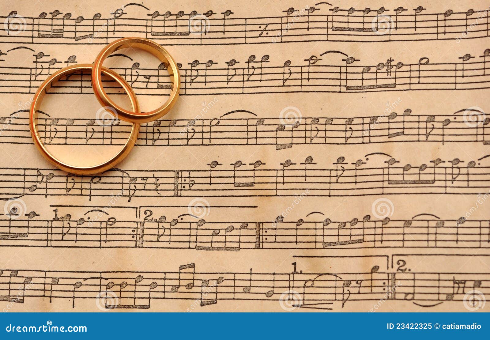 Wedding rings on music stock image. Image of music, wedding - 23422325