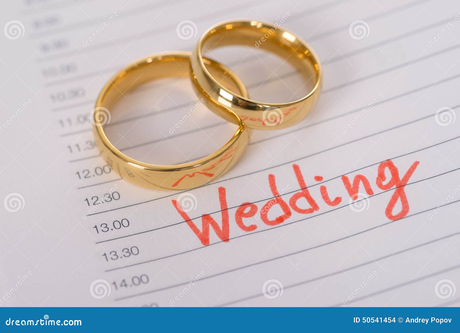 Wedding Rings on Paper with Time Stock Photo - Image of number, gold ...