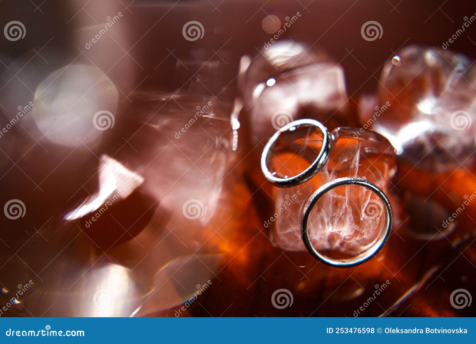 Wedding Rings on a Piece of Ice Stock Photo - Image of ceremony ...