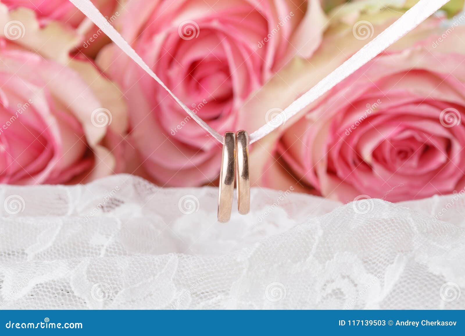 Wedding Rings and Pink Roses Stock Image - Image of isolated, jewelry ...