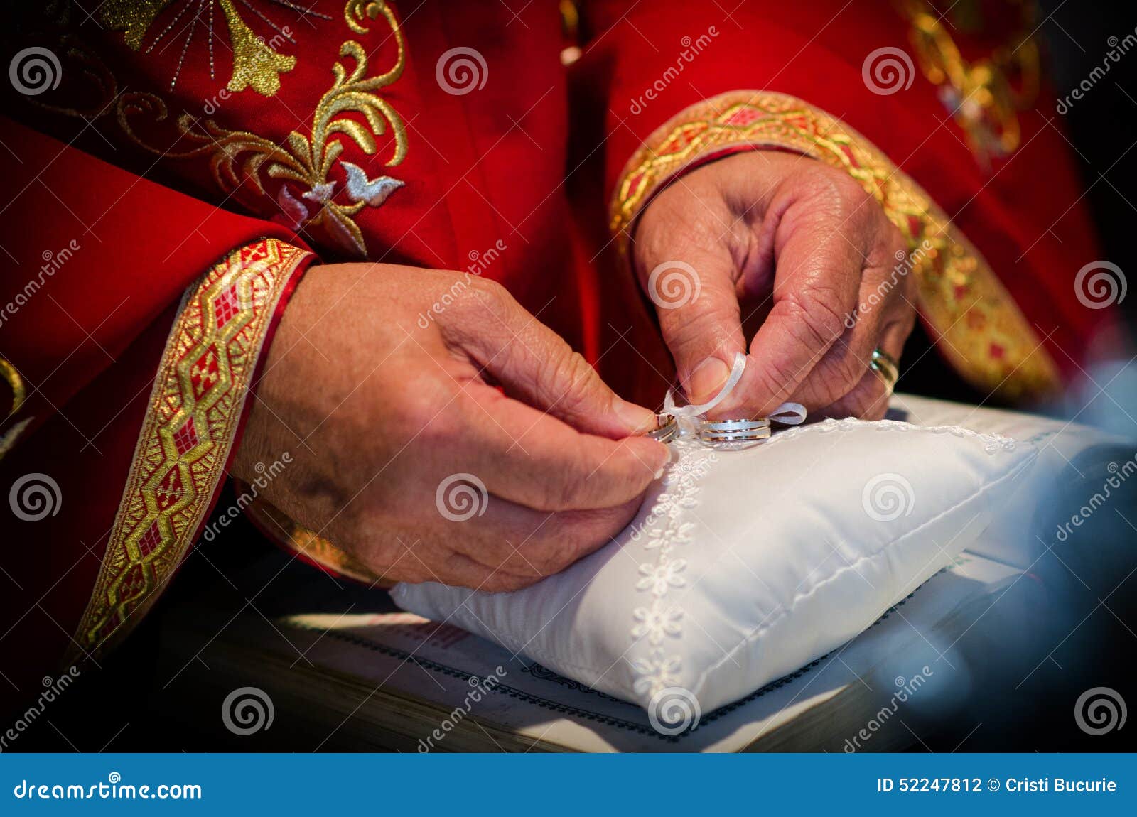 Wedding rings stock photo. Image of priest, couple, holding - 52247812