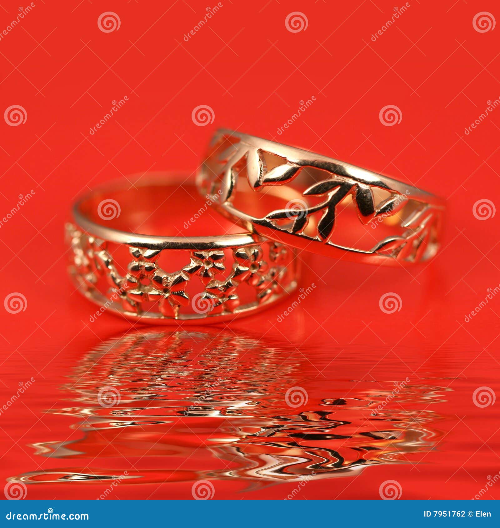 Wedding Rings on Red Background Stock Photo - Image of shining, gold ...